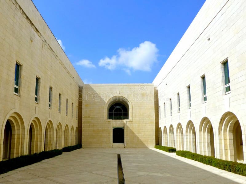Minimalist Courtyard Design of a Public Building with Arches and ...