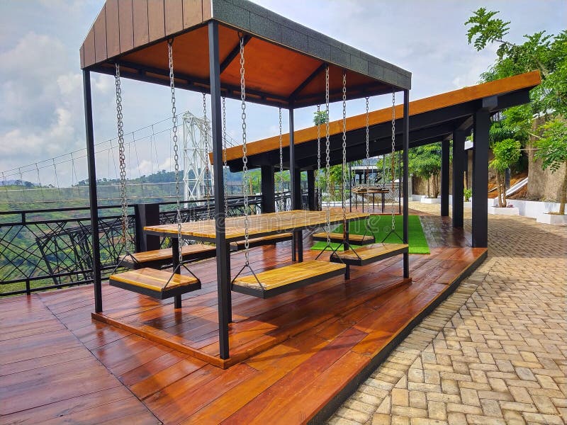 Minimalist Culinary Stand Swing Table Design in the Nice Funtastic Park ...