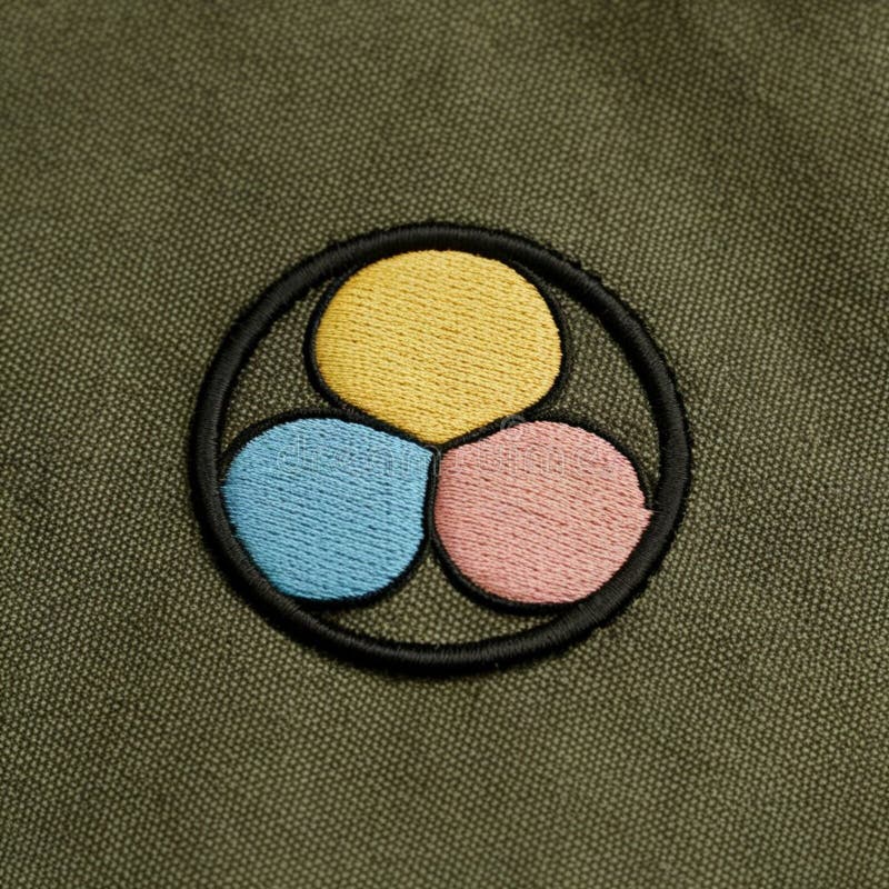 A Minimalist Embroidered Patch on a Smooth Canvas Fabric Stock ...