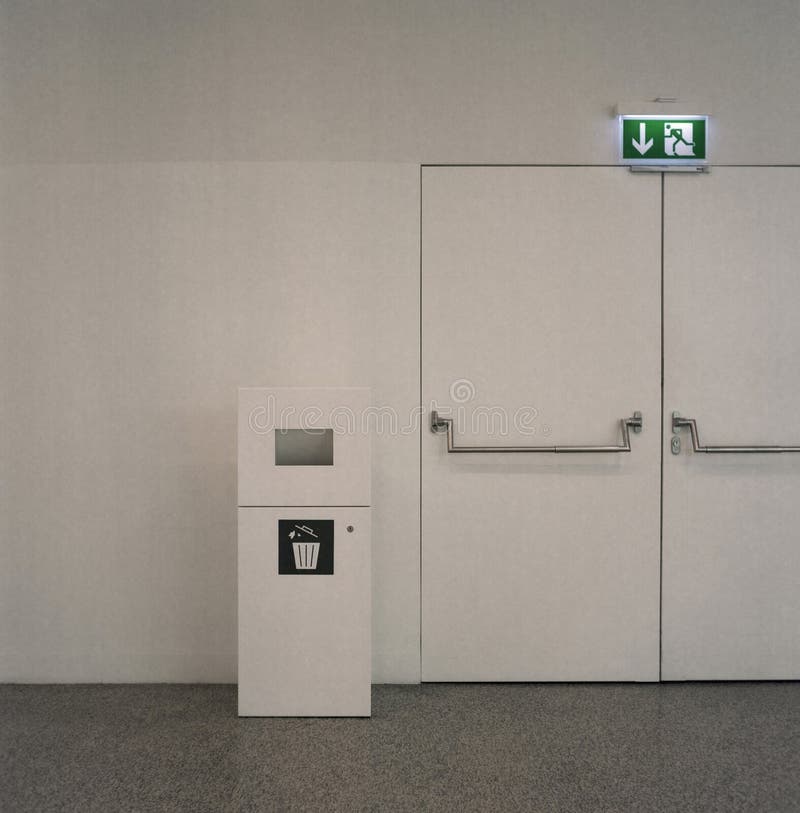 Minimalist Emergency Exit with Double Doors, Waste Bin, and Green ...