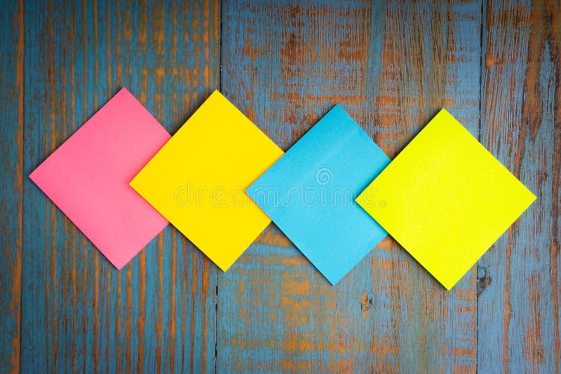 Minimalist Flat Lay Composition of Sticky Notes on the Wooden Table Top ...