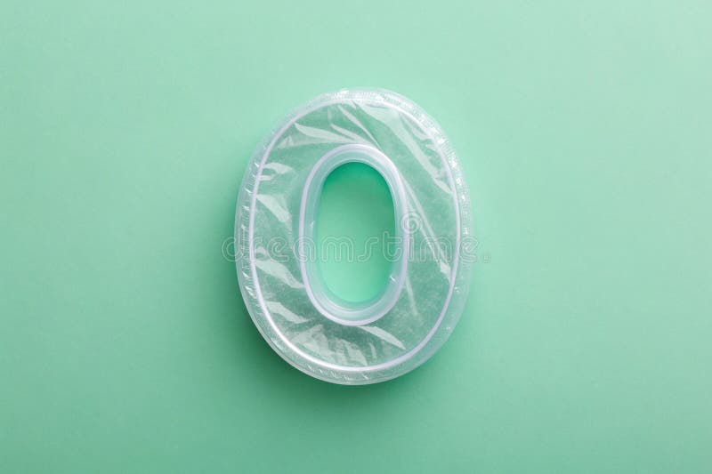 Minimalist Floating Transparent Letter O in a Soft Green Gradient Stock ...