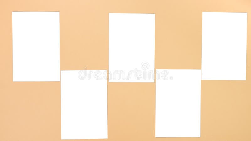 Five Blank White Paper Sheets Arranged on a Beige Wall for Creative ...