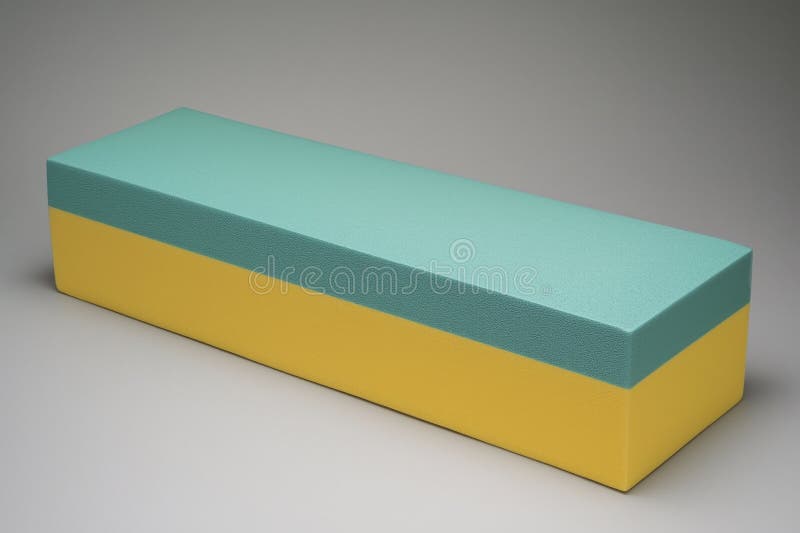 Minimalist Rectangular Foam Object with Teal Top and Yellow Base ...
