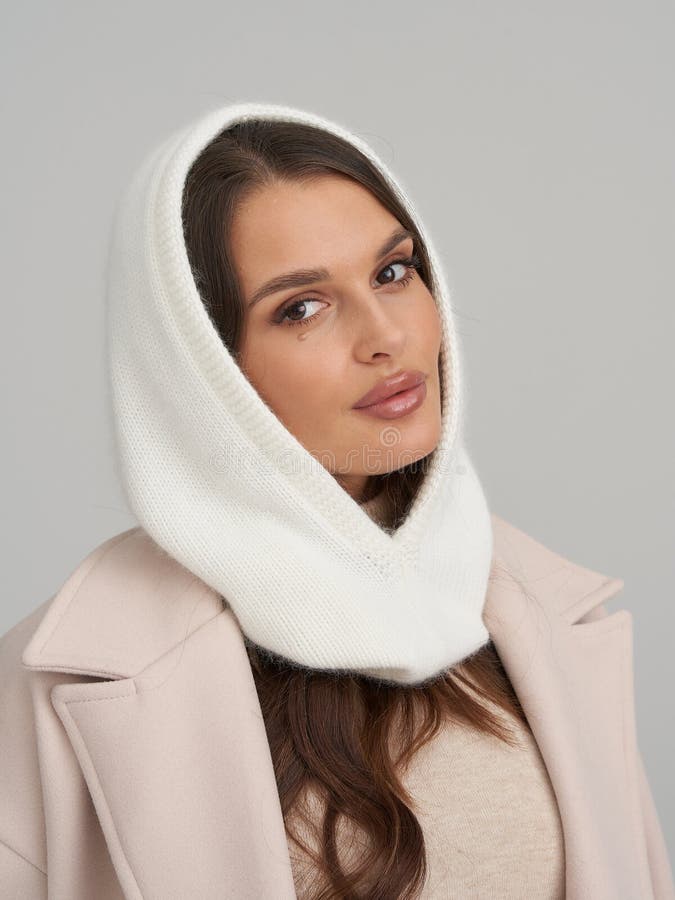 Elegant Winter Fashion Shoot Featuring a Model in a Soft White Hood and ...