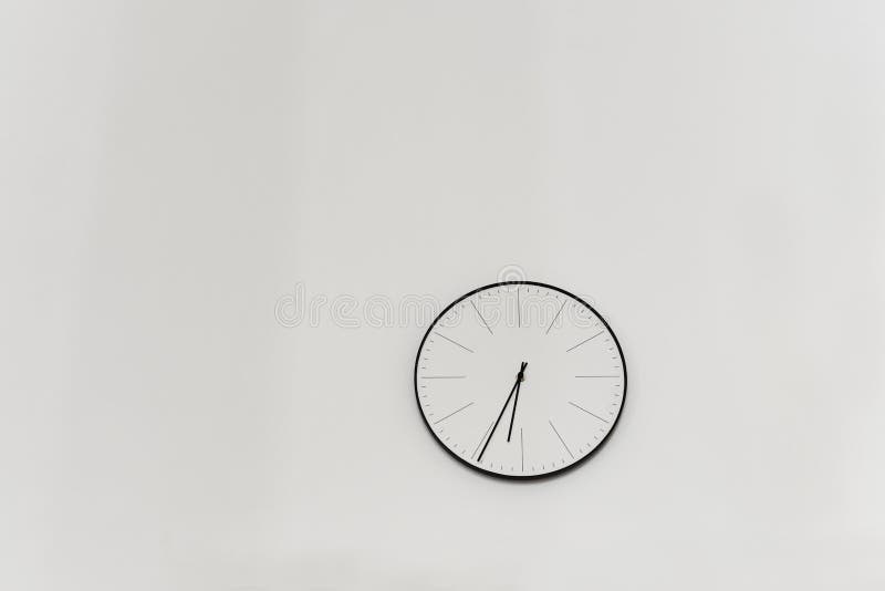 Minimalist Style Clock on a White Wall. Stock Photo - Image of circle ...