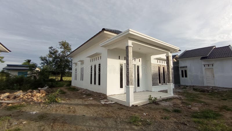 Minimalist Tiny House Building on the Field with Low Budget Stock Photo ...