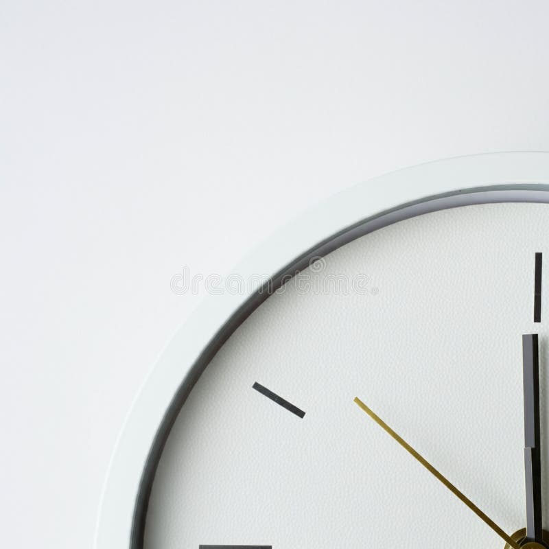 Minimalist Wall Clock with a White Face and Black Hour Markers. the ...