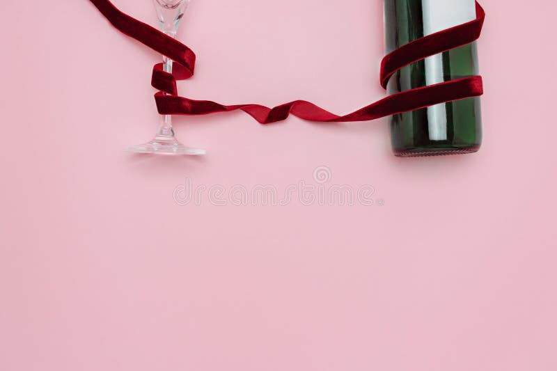 Minimalist Wine and Red Ribbon Creative Scene on a Pink Background ...