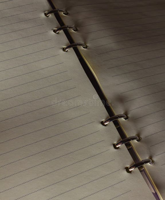 Open Ring Binder Notebook with Lined Pages Under Warm Light Stock Photo ...