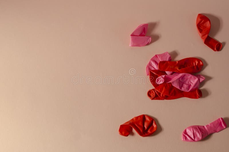 Minimalistic Composition with Deflated Balloons on a Pink Backgr Stock ...