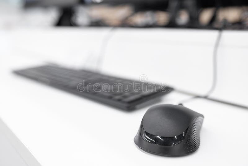 Minimalistic Computer Workplace with Computer Mouse in Focus and ...