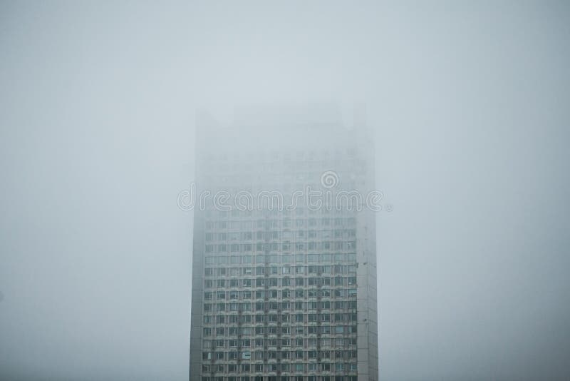 Building in the fog stock image. Image of architecture - 110674701
