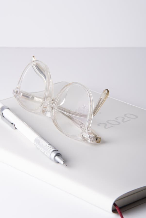 Clear Spectacles and Pen on a 2020 Diary Stock Image - Image of eyewear ...