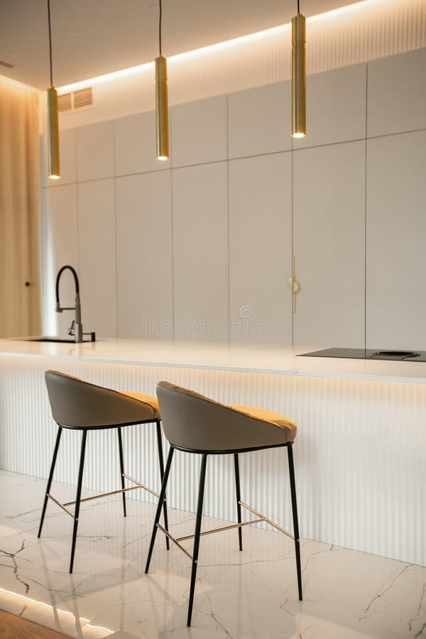 Minimalistic Light Interior of Modern Kitchen with Island and High ...