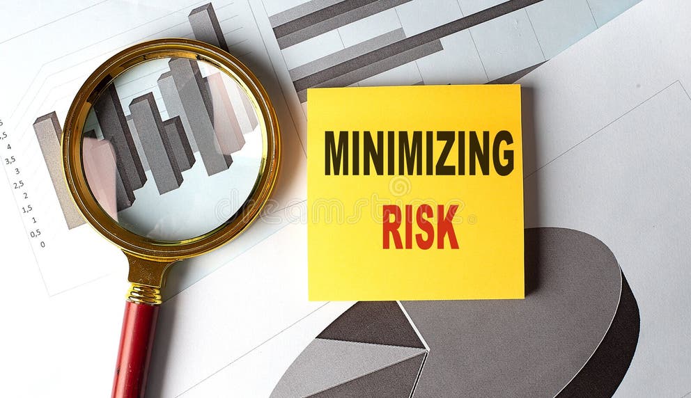 MINIMIZING RISKS Text on Sticky on Chart Stock Image - Image of ...