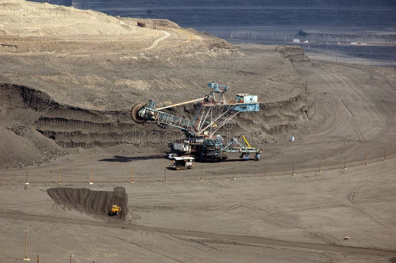 Mining, Bucket Wheel Excavator and Loader Stock Photo - Image of ...