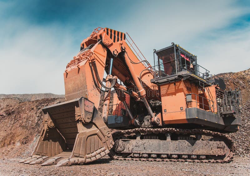 Mining Equipment at Work in a Quarry Stock Photo - Image of earthmover ...