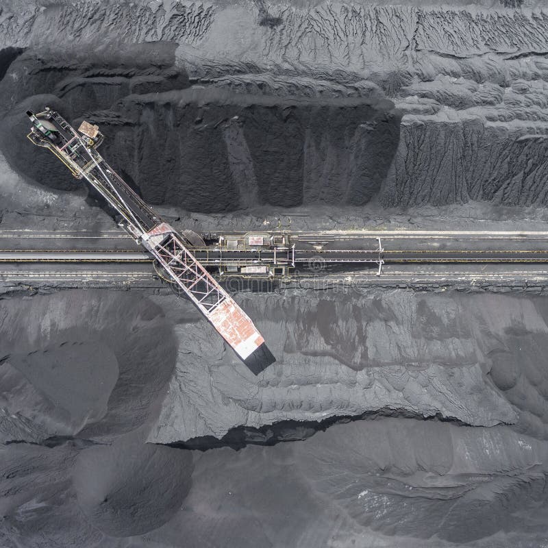 Mining Excavator on the Bottom Surface Mine. Brown Coal Deposits Stock ...
