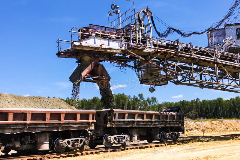 Mining Machine Loadind Sand in Train Cars Stock Photo - Image of ...
