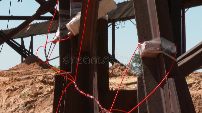 Mining of a Metal Structure with a Red Dynamite Block TNT. Blasting ...