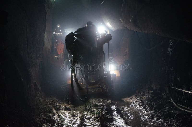 Mining Operator on Mining Machine, Underground Mine Mesh. Stock Photo ...