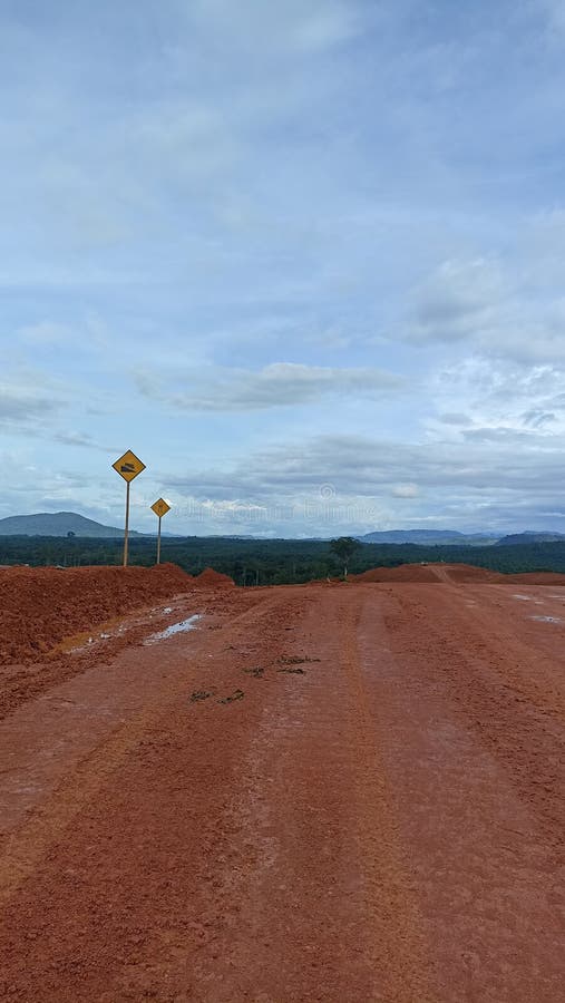 Mining Road with Sign and Mountains Stock Image - Image of road, mining ...