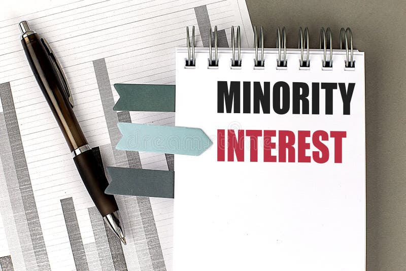 MINORITY INTEREST Text on Notebook with Chart on Gray Background Stock ...