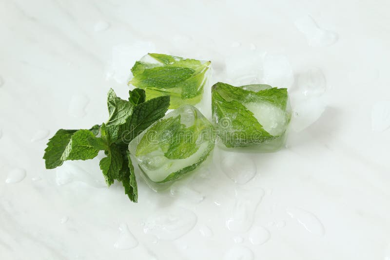 Mint flavored ice cubes stock image. Image of space - 138581921
