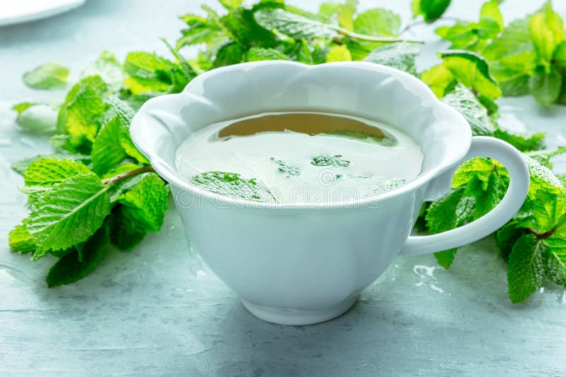 Mint Tea. a Cup of Peppermint Tea with Fresh Mint Leaves Stock Photo ...