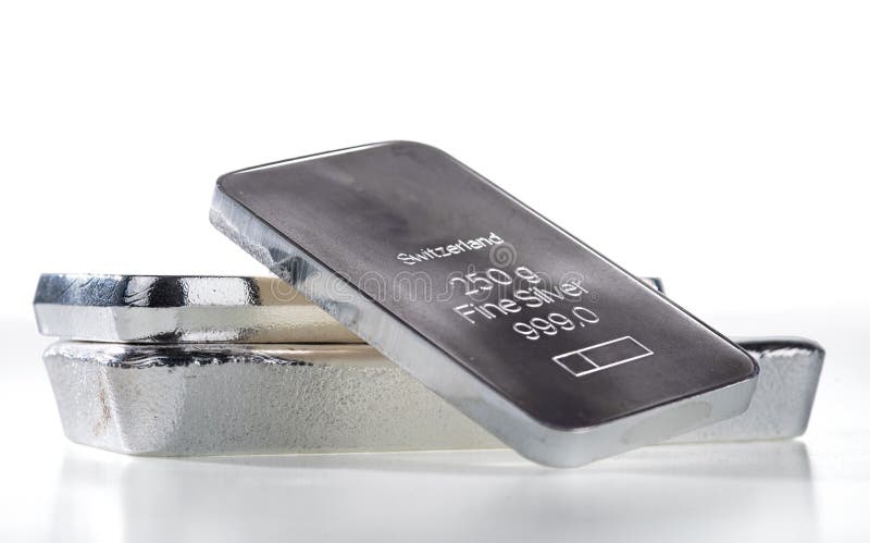 Minted Silver Bar Weighing 250 Grams Against a Background of a Stack of ...