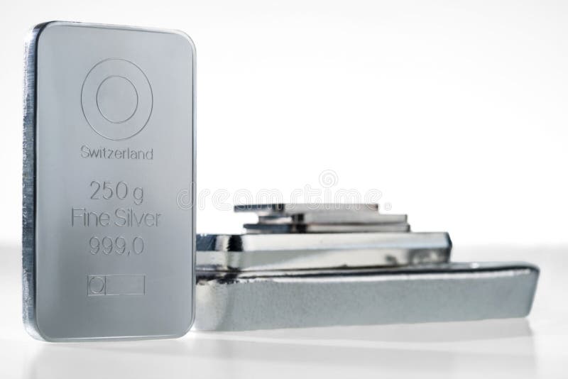 Minted Silver Bar Weighing 250 Grams and Stack of Silver Ingots Stock ...