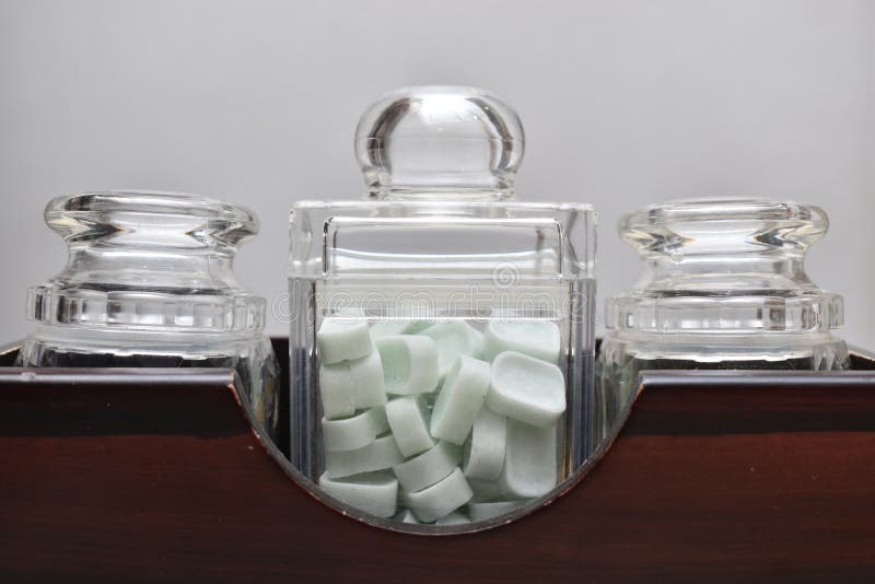 Mints in Glass Jar with Two Glass Jar Stock Image - Image of sauf ...