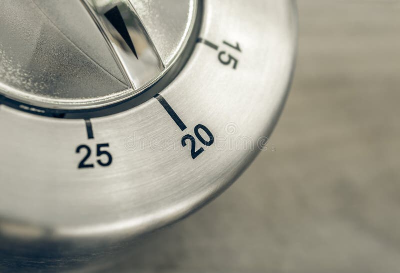 20 Minutes - Macro of an Analog Chrome Kitchen Timer on Wooden Table ...