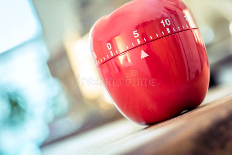 5 Minutes - Red Kitchen Egg Timer in Apple Shape on a Table Stock Image ...