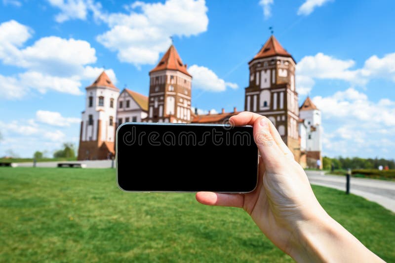 Mir, Belarus - April 22, 2025: the Mir Castle in Belarus. Hand Holding ...