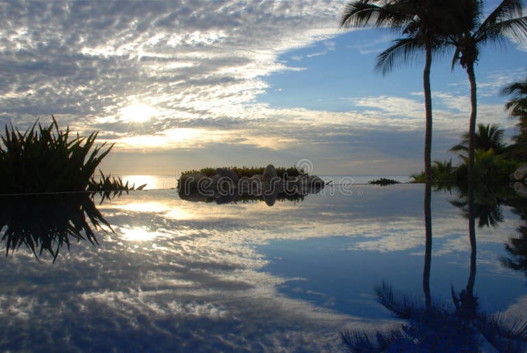 Mirror Effect in Endless Pool Los Cabos Stock Image - Image of palms ...