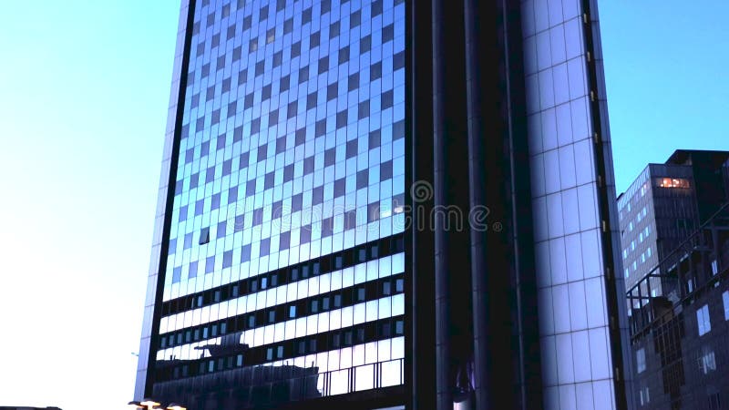 Mirror Facade of a Building with Capsule-shaped External Elevator Stock ...
