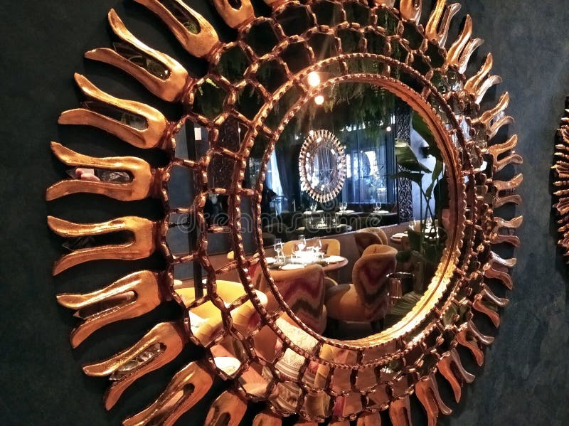 Mirror in Form of the Sun in Bronze Frame. Reflection of a Luxury ...