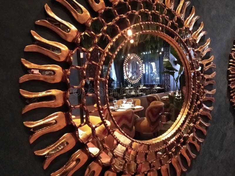 Mirror in Form of the Sun in Bronze Frame. Reflection of a Luxury ...