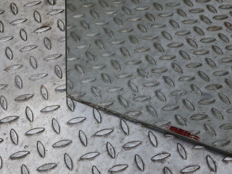 Mirror on a grey tearplate stock photo. Image of plate - 111235998