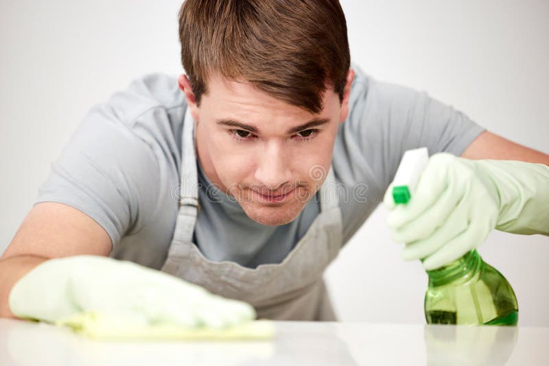Is this a Mirror because Its so Clean. a Young Man Cleaning a Table ...