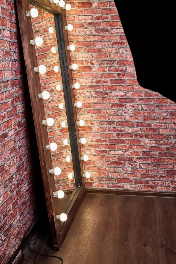 Mirror with Light Bulbs Near the Red Brick Wall. Background and Texture ...