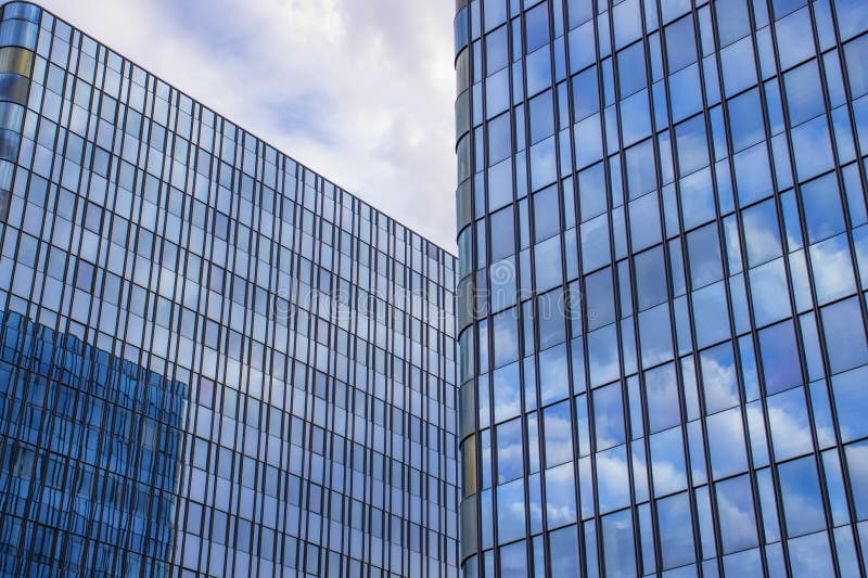 Mirror Skyscraper with a Reflection of a Clear Sky with Clouds Stock ...