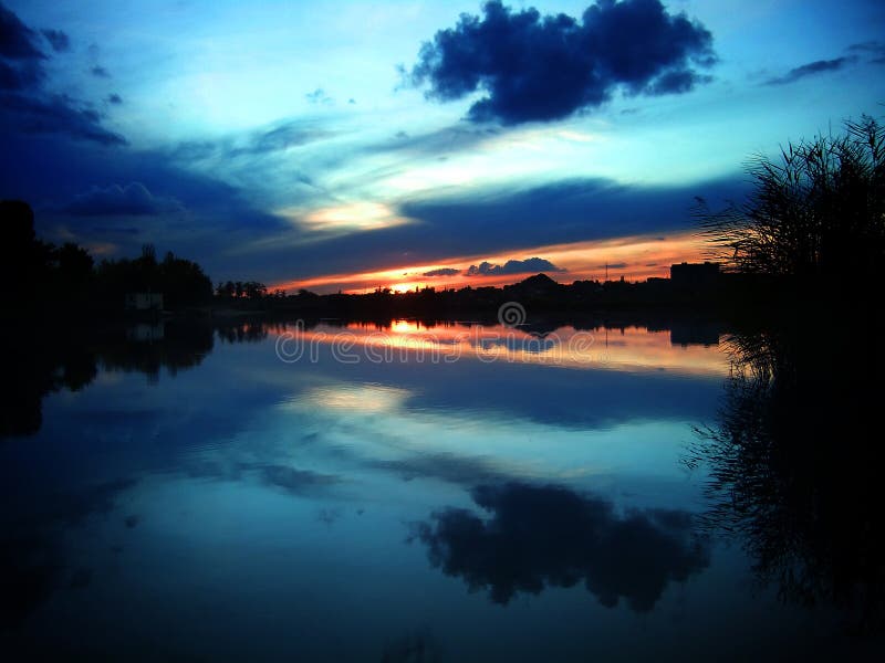 Mirror sunset stock image. Image of mirror, quiet, expanse - 55978597