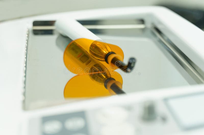 On the Mirror Surface Lies a Device for Filling and Drying Teeth - a ...