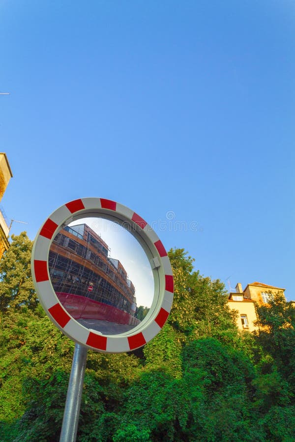 Mirror Traffic Sign with a Building Reflection Stock Image - Image of ...