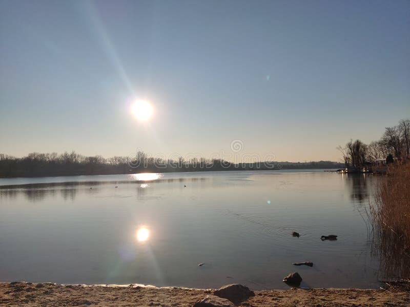 The Mirror Water Reflects a Ray of Bright Sun Stock Image - Image of ...