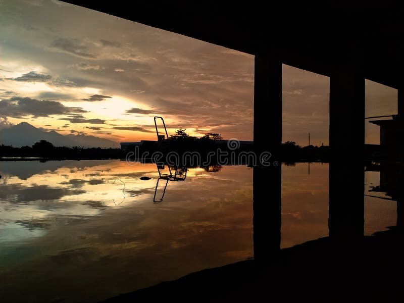 The Mirror World in the Sunset Stock Photo - Image of mirror, skies ...