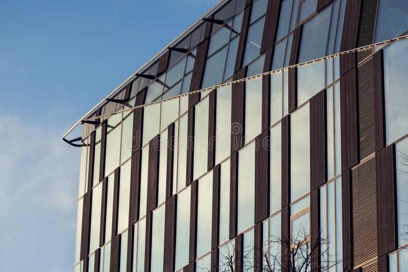 Mirrored Facade Building. Modern Office Against Blue Sky Stock Photo ...